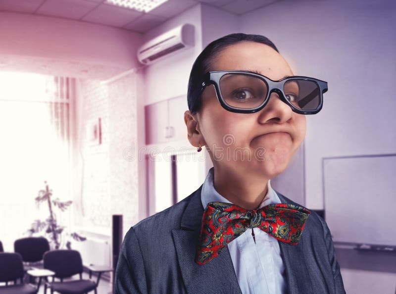 Funny thoughtful nerd girl stock photo. Image of indoor - 53057628