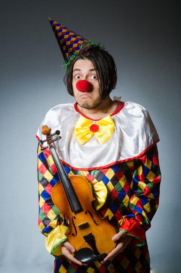 The Funny Violin Clown Player in Musical Concept Stock Image - Image of ...