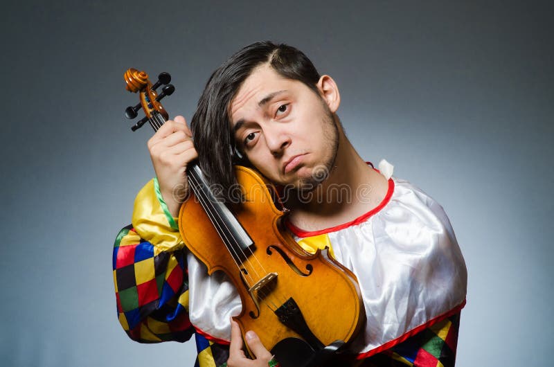 Funny Violin Clown Player in Musical Concept Stock Photo - Image of ...