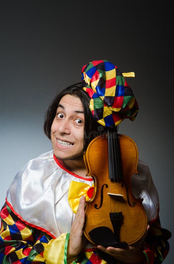 The Funny Violin Clown Player in Musical Concept Stock Image - Image of ...