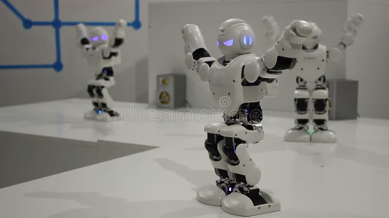 Funny white dancing robots stock footage. Video of future - 84962150