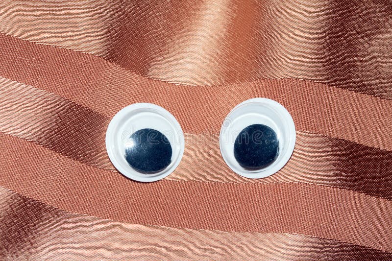 Funny Wiggle Google Eyes on Fabric Background Stock Image - Image of ...