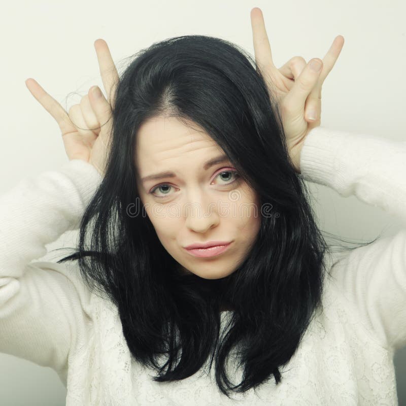 Funny Woman Doing Hand Sign Stock Image - Image of enjoyment, cheerful ...