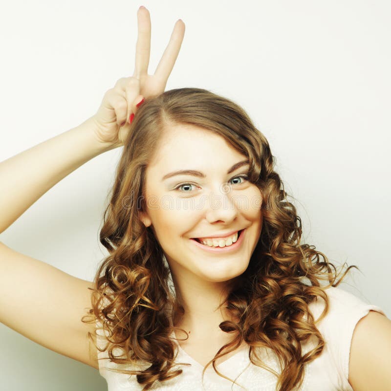 Funny Woman Doing Hand Sign Stock Photo - Image of sign, humor: 60809960