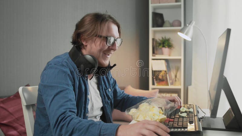 Funny Young Man in Headset with Pc Computer Playing Game at Home. Stock ...