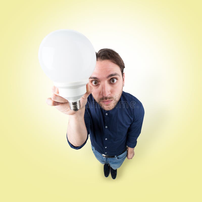Funny Young Man with Light Bulb in His Hand Stock Image - Image of ...