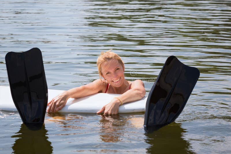 Funny Young Woman in Flippers on Water. Stock Photo - Image of ...