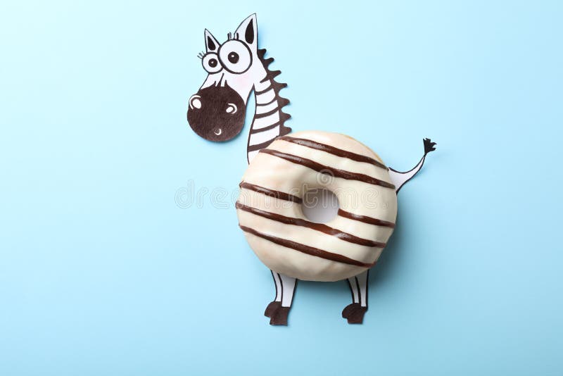 Funny Zebra Made with Donut on Light Blue Background, Top View Stock ...