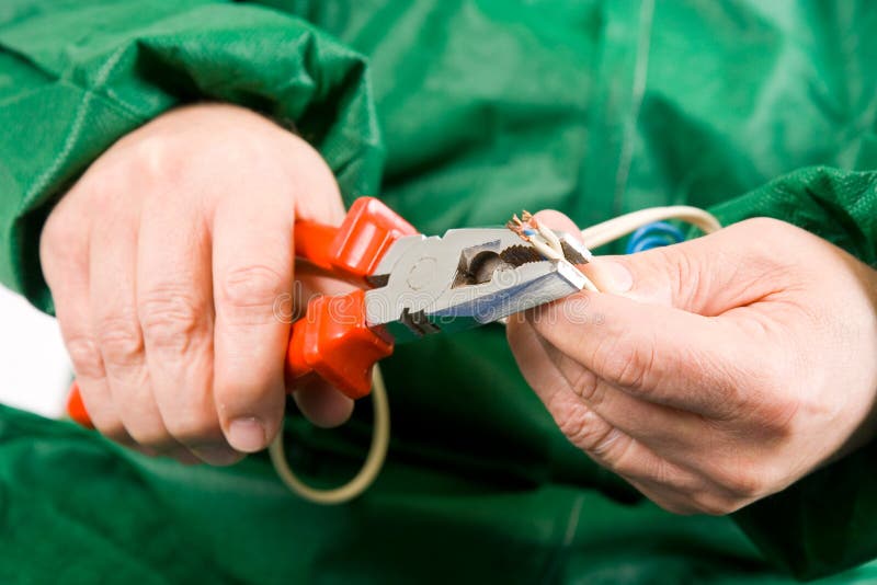 Funzionando con le pinze immagine stock. Immagine di mano - 13924759