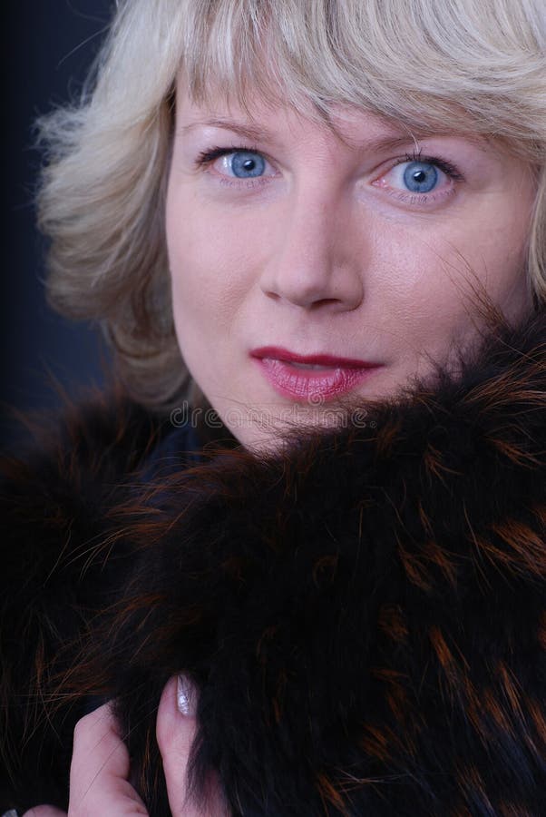 Fur coat woman stock image. Image of beauty, cute, people - 9165713