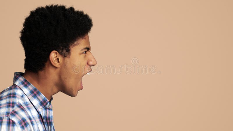 Furious Afro Guy Shouting Over Light Background Stock Photo - Image of ...