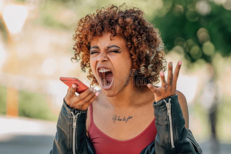 Angry Girl Screaming with Mobile Phone Stock Image - Image of ...