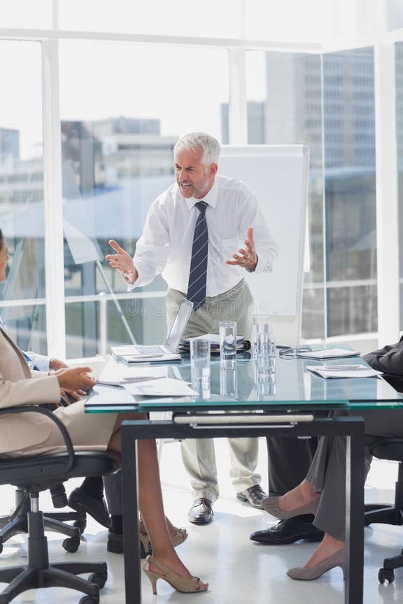 Furious Boss Gesturing in Front of Employees Stock Photo - Image of ...