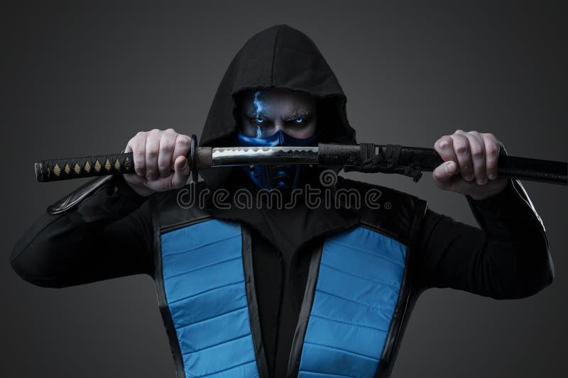 Furious Ice Ninja with Katana Staring at Camera Stock Image - Image of ...