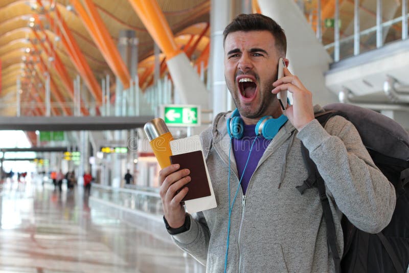 Furious Man Getting a Call at the Airport Stock Photo - Image of ...