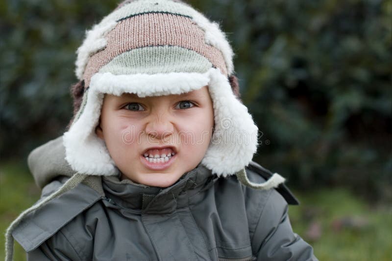 Furious Winter Boy stock photo. Image of attitude, cold - 1683068