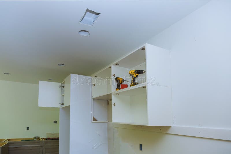 Furniture Assembling of Custom New Kitchen Cabinets Stock Image - Image ...