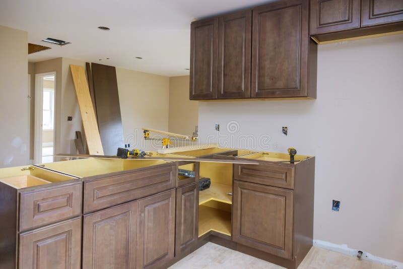 Furniture Assembling of Custom New Kitchen Cabinets Stock Photo - Image ...