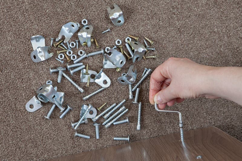 Furniture Assembly Hand Tool, Hex Wrench Screwed into Furn Stock Image ...