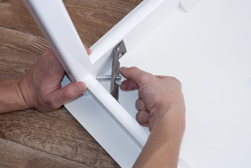 Furniture assembly, table stock photo. Image of repair - 107635672