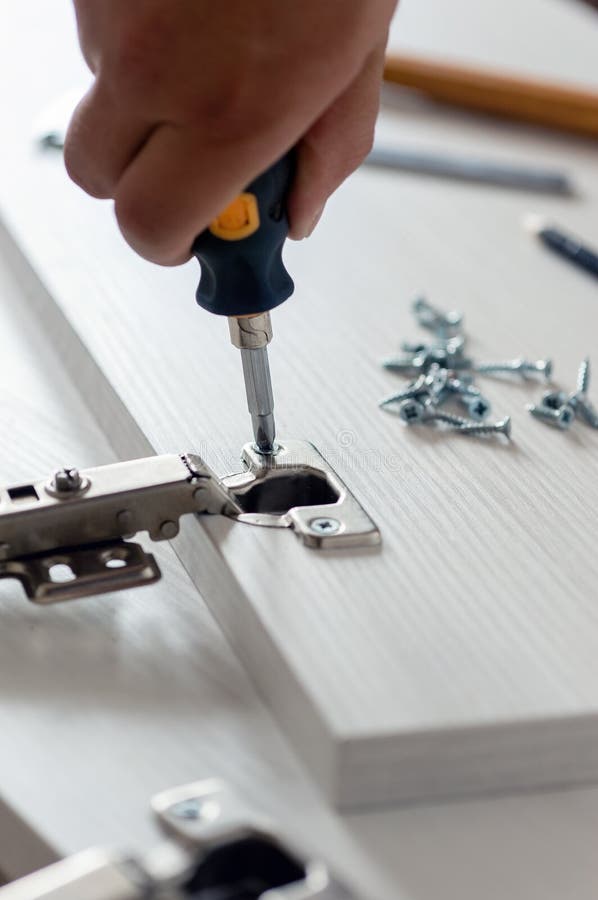 Furniture assembly. stock image. Image of technology - 132561275