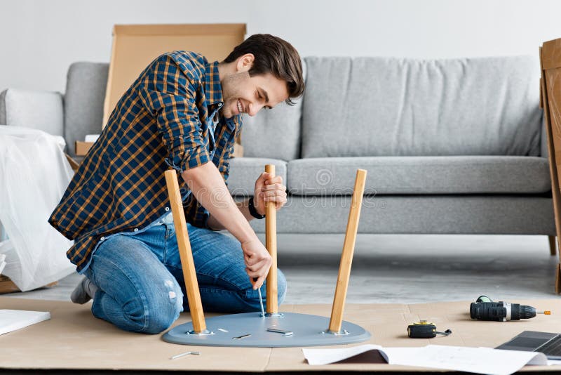 Furniture Repair And Assembly Handyman Fixing Table Using Tool
