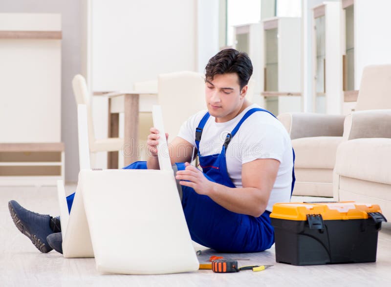 Furniture Repairman Working in Store Stock Photo - Image of repair ...