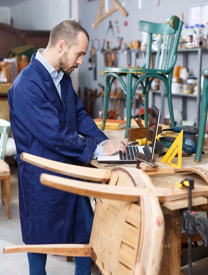 Restorer Using Laptop in Process of Renovation Stock Image - Image of ...