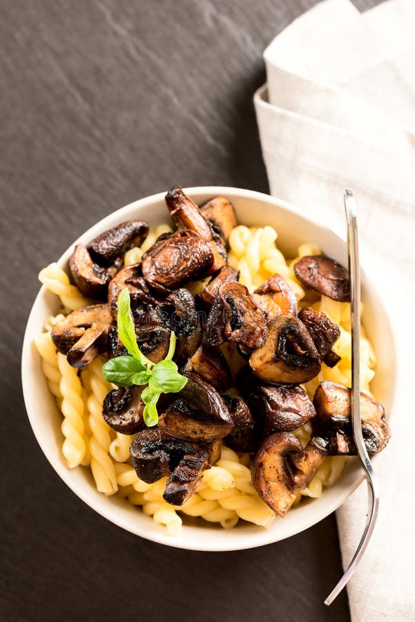 Fusilli with mushrooms stock image. Image of gourmet - 59875609