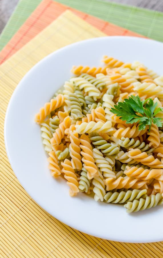 Fusilli pasta stock photo. Image of green, plate, cuisine - 32698284
