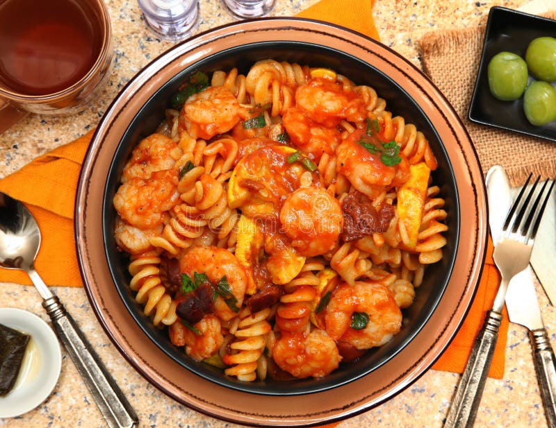 Fusilli Pasta and Shrimp stock photo. Image of olives - 97465846