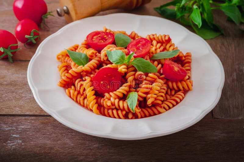 Fusilli Pasta with Tomato Sauce and Basil Stock Image - Image of herb ...