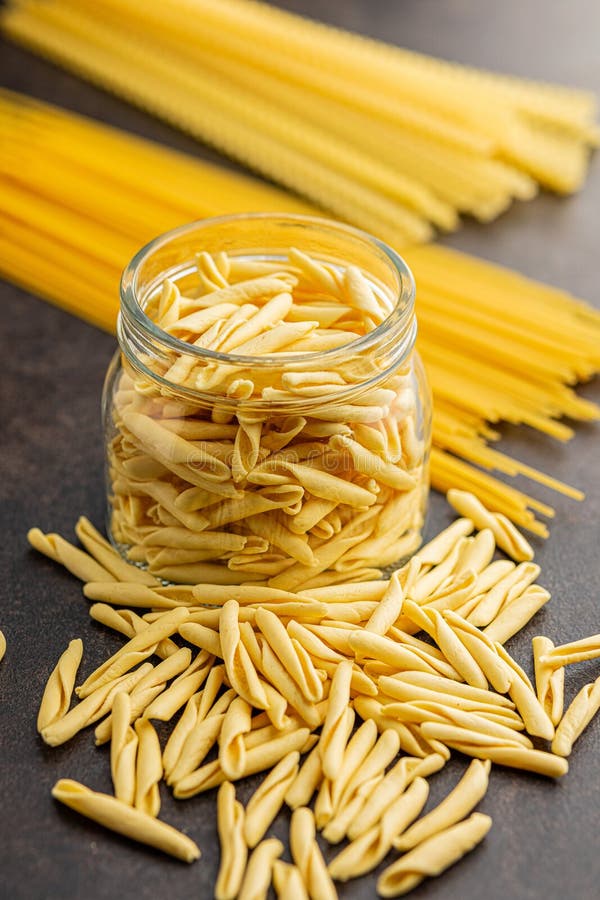 Fusilli Pugliesi. Italian Twisted Pasta and Spaghetti on Black Table ...