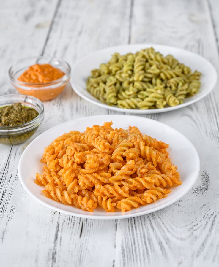 Fusilli with Traditional and Tomato Pesto Stock Photo - Image of lunch ...