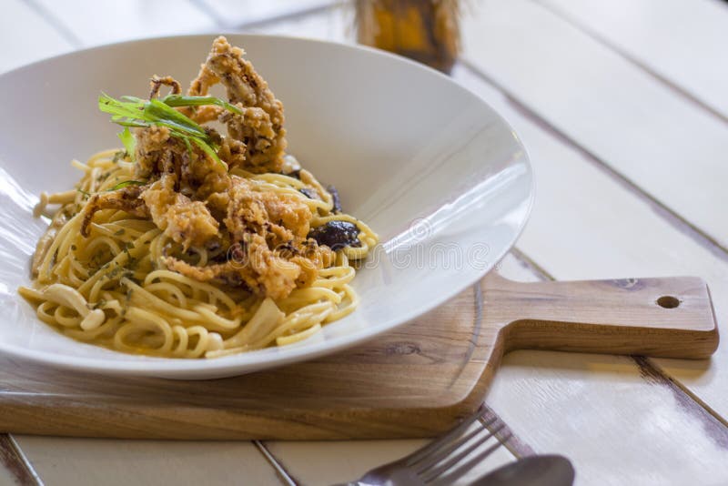Fusion Aglio Olio Spaghetti with Fried Soft Shell Crab Stock Image ...