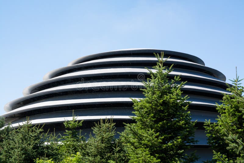 Futuristic Disc-shaped Building in the Theme Park. Stock Image - Image ...
