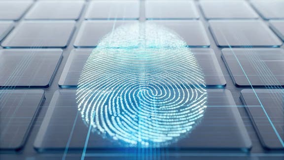 Futuristic Fingerprint Overlaying a Computer Keyboard in a Pixelated ...