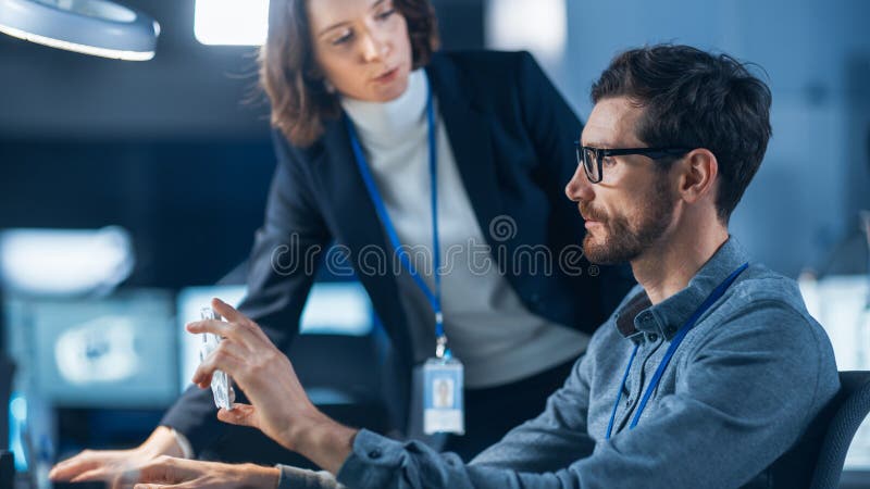Futuristic Machine Engine Development Engineer Working on Computer at ...