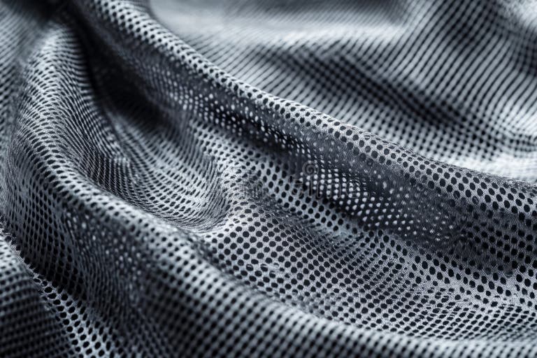 A Futuristic Metallic Mesh Fabric Texture Background in Gunmetal Silver ...