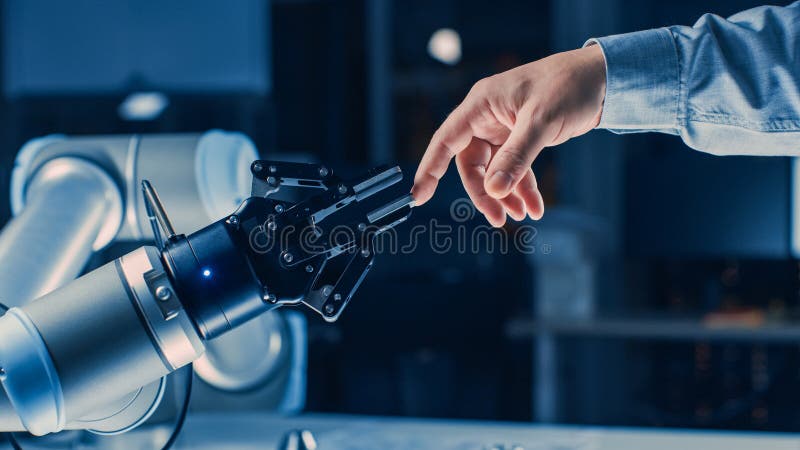 Futuristic Robot Arm Touches Human Hand in Humanity and Artificial ...