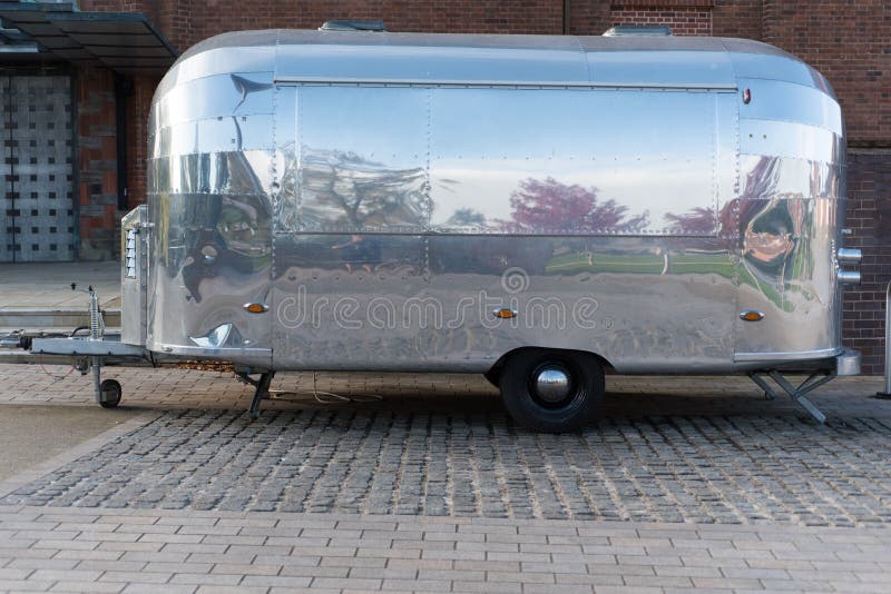 Stainless Steel Caravan with Reflection Stock Image - Image of diner ...