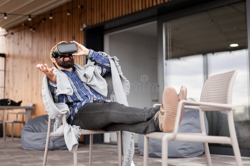 Futuristic Virtual Reality Glasses. Adult Man Use VR Tech Headset Stock ...