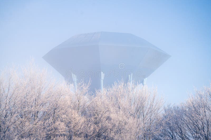 Futuristic Water Supply Tower on Cold Morning Stock Photo - Image of ...