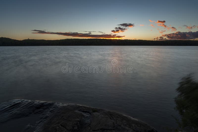 Fuzzy Lake Water with Sunset Stock Photo - Image of looking, fuzzy ...
