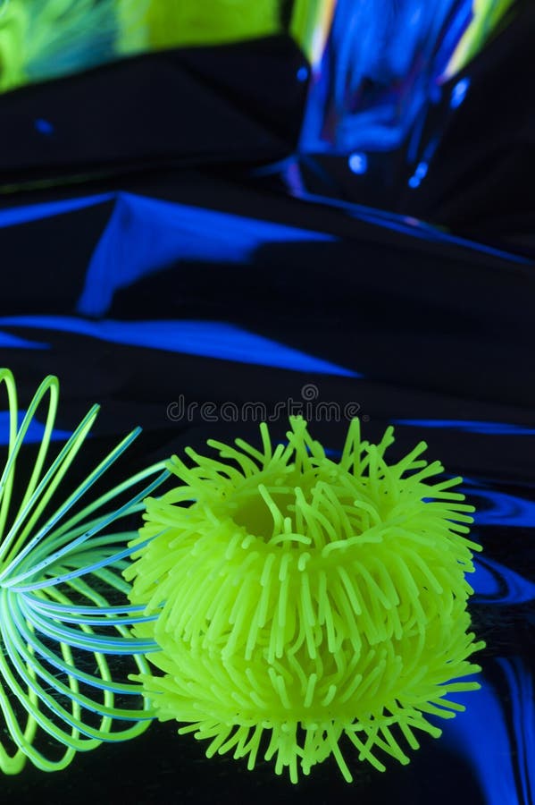 Fuzzy Objects in Close-up View are Lit with Fluorescent Colors Against ...