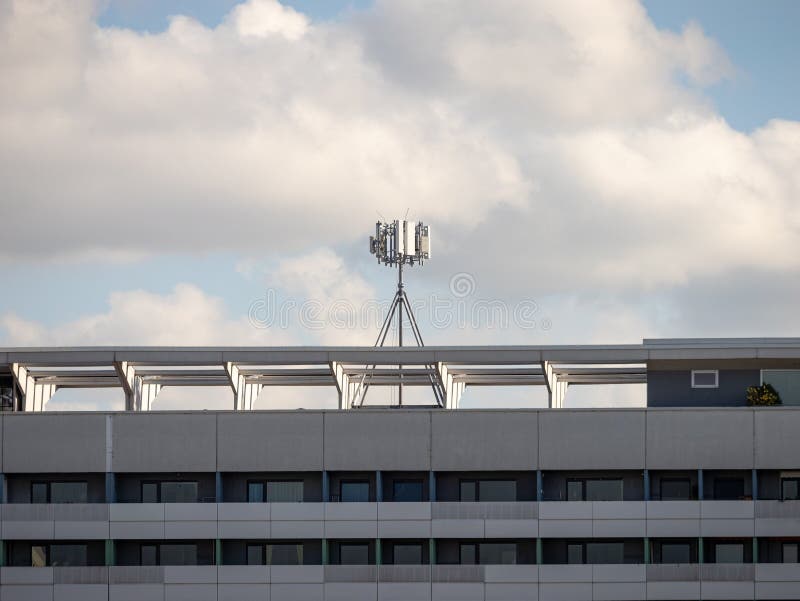 5G Antenna on a Rooftop of a Residential Building Stock Photo - Image ...