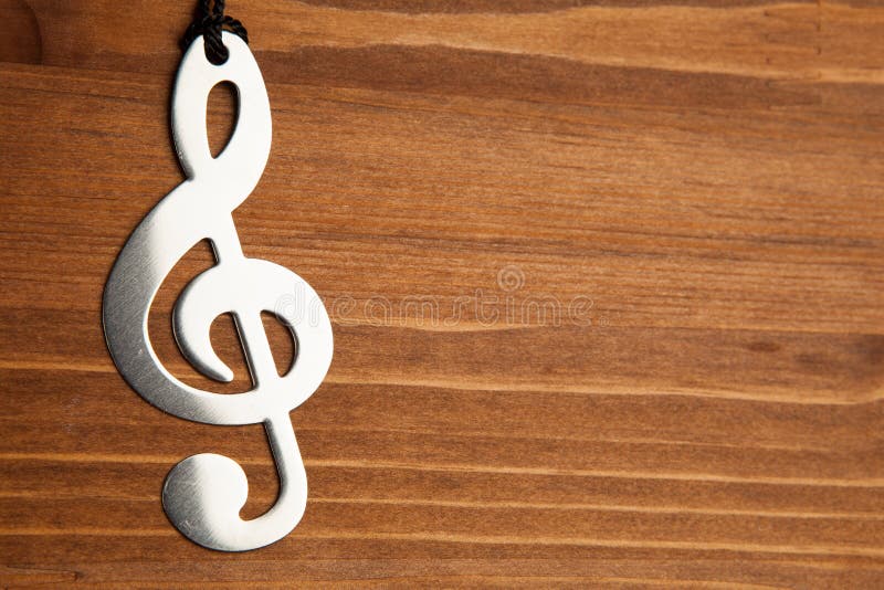 G-klav Symbol Som Snidas Från Trä Arkivfoto - Bild av melodi, dekorera ...