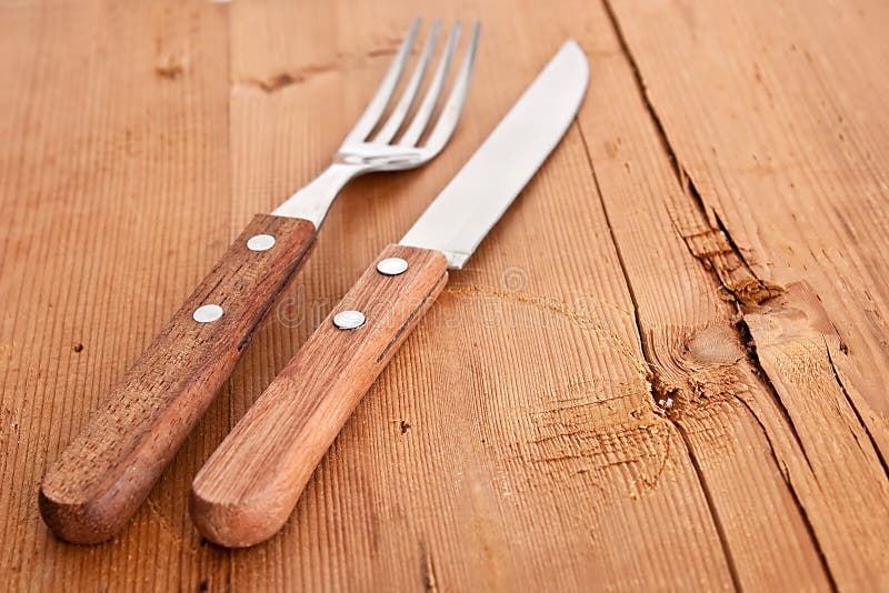 Gabel und Messer stockfoto. Bild von rustikal, holz, hölzern - 13513876