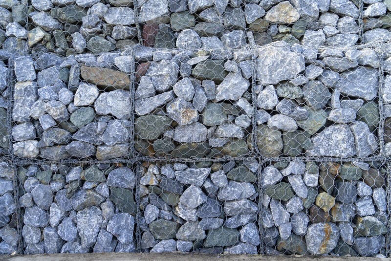 Gabion fences, Stone wall stock image. Image of stacked - 128633351