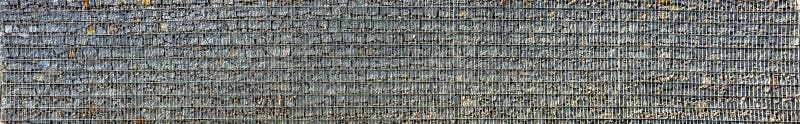 Gabion, a Stone Wall with a Metal Grid of Gray Granite Texture Stock ...